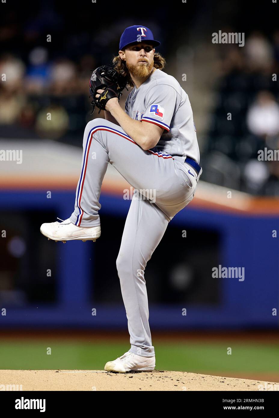 Texas Rangers pitcher Jon Gray throws against the New York Mets during ...