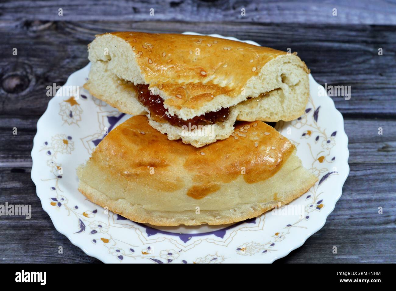 Fig fruit jam stuffed inside a tandyr nan Uzbek bread, a type of ...