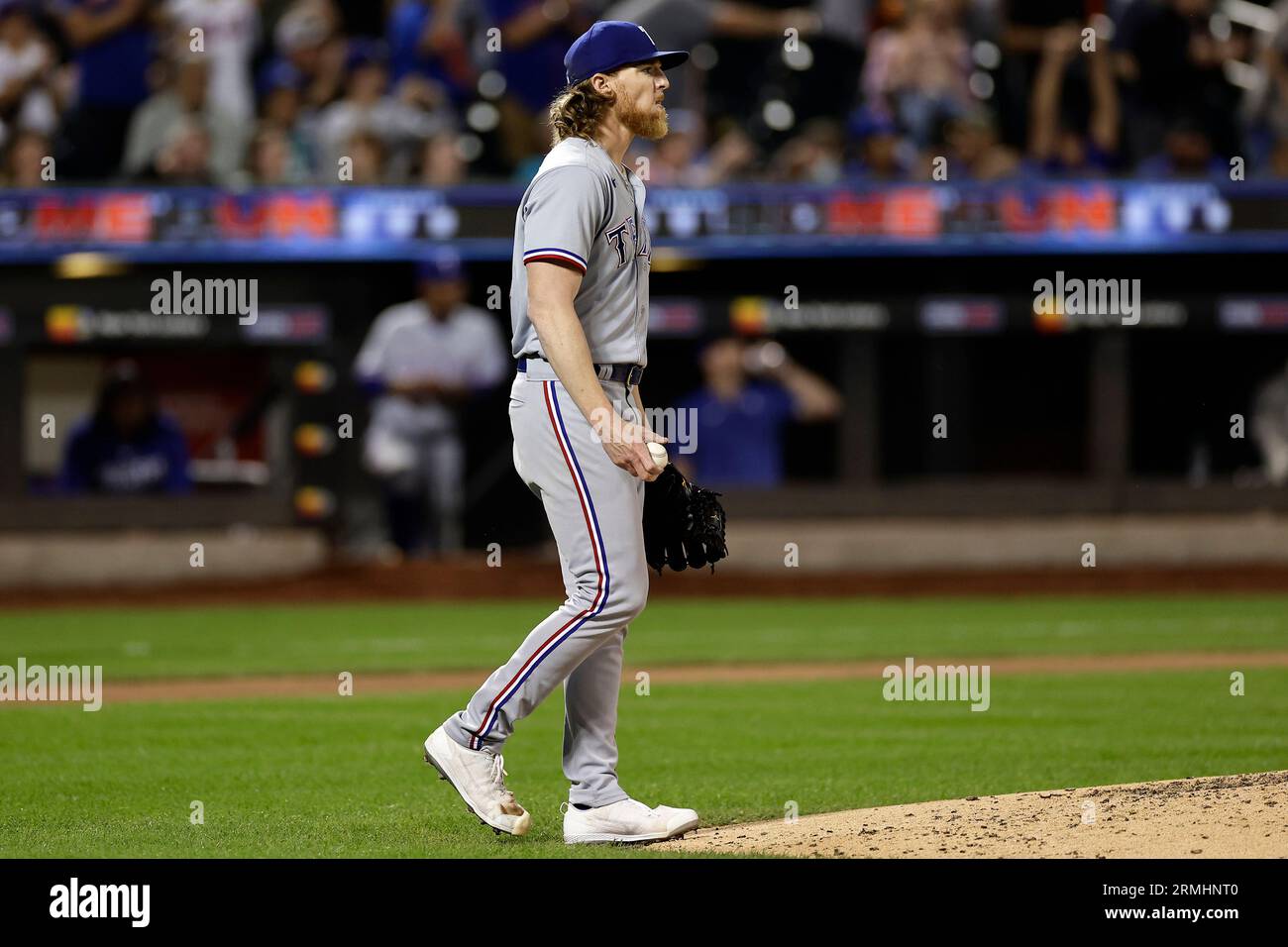 Texas Rangers pitcher Jon Gray reacts after giving up a home run to New ...