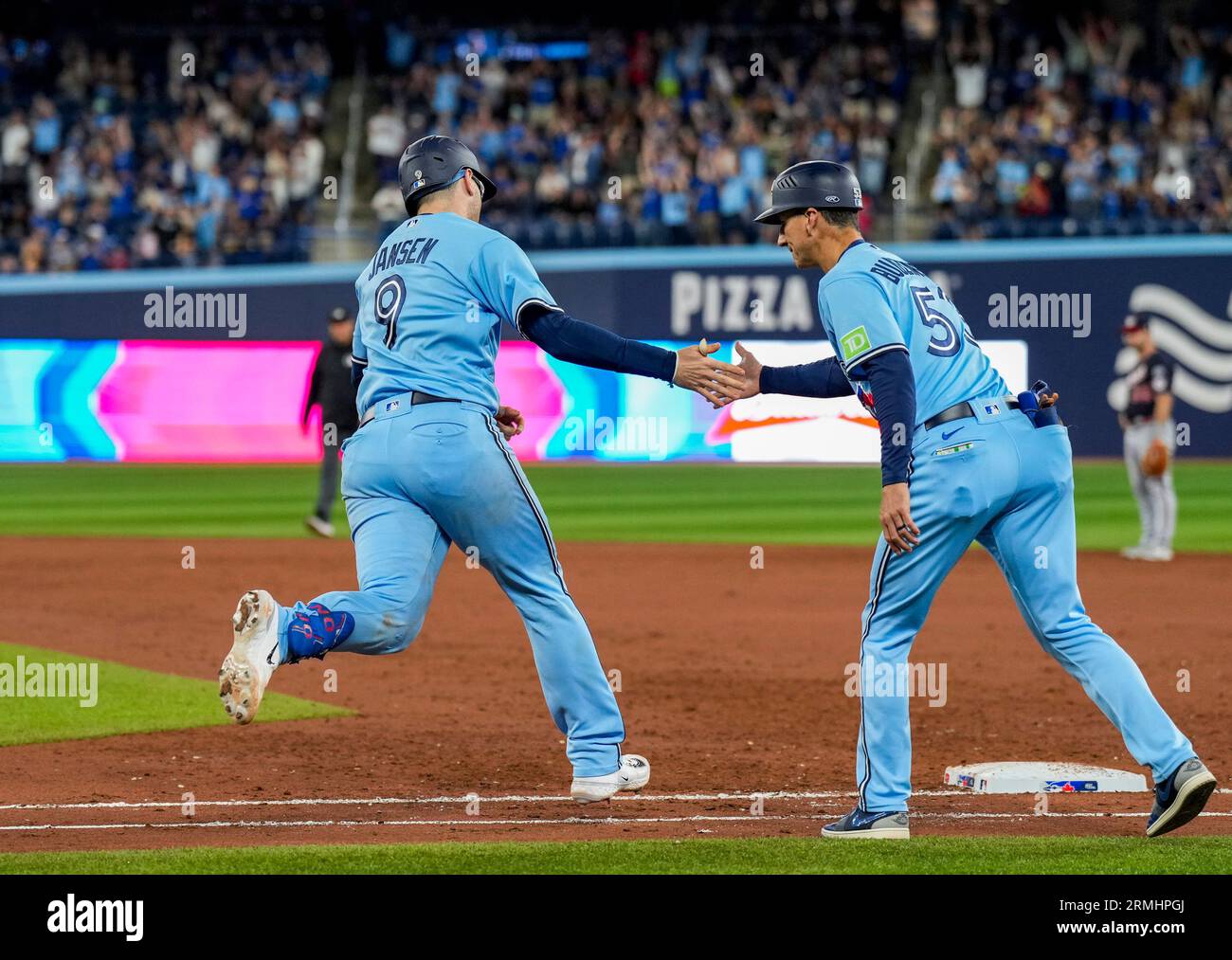 Toronto Blue Jays catcher Danny Jansen (9) celebrates his home run with ...