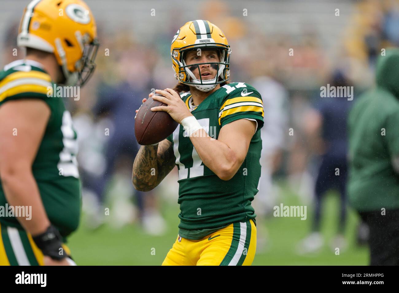 Green Bay Packers quarterback Alex McGough (17) throws passes in ...