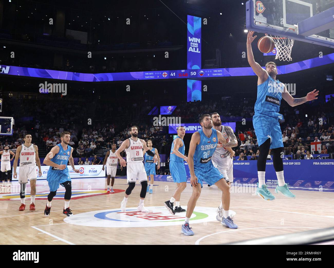 Okinawa, southern Japan, on Aug. 28, 2023. Slovenia's Luka Doncic (far ...