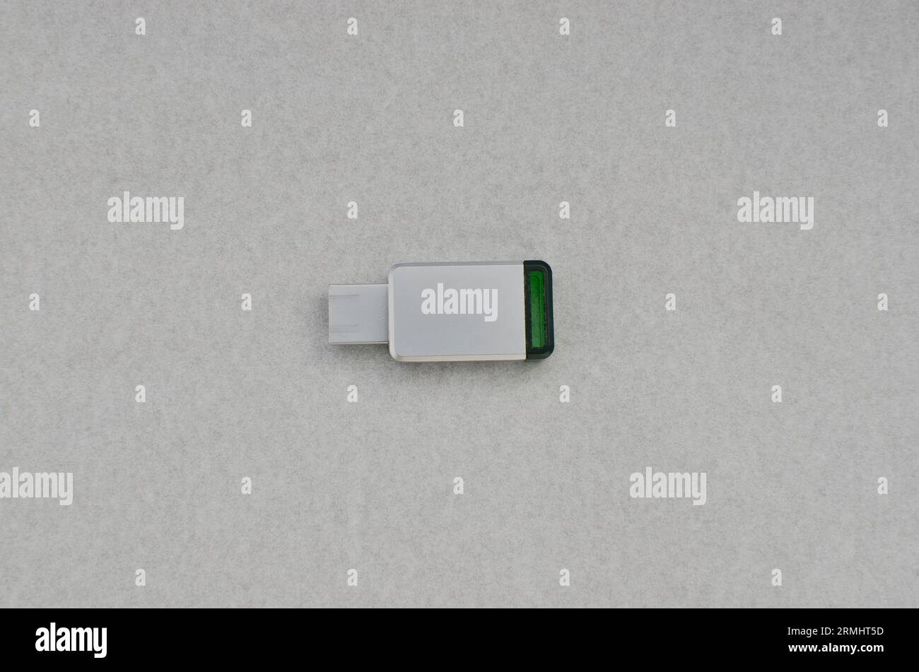 Aluminum flash drive close-up, modern and sturdy USB storage stick ...