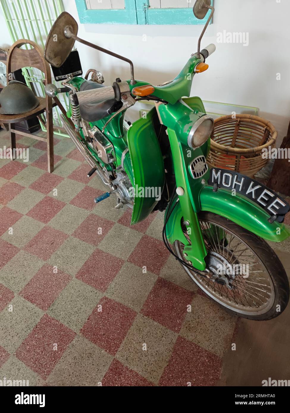 An Old antic Honda cub motorcycle left at the corridor on displayed at ...