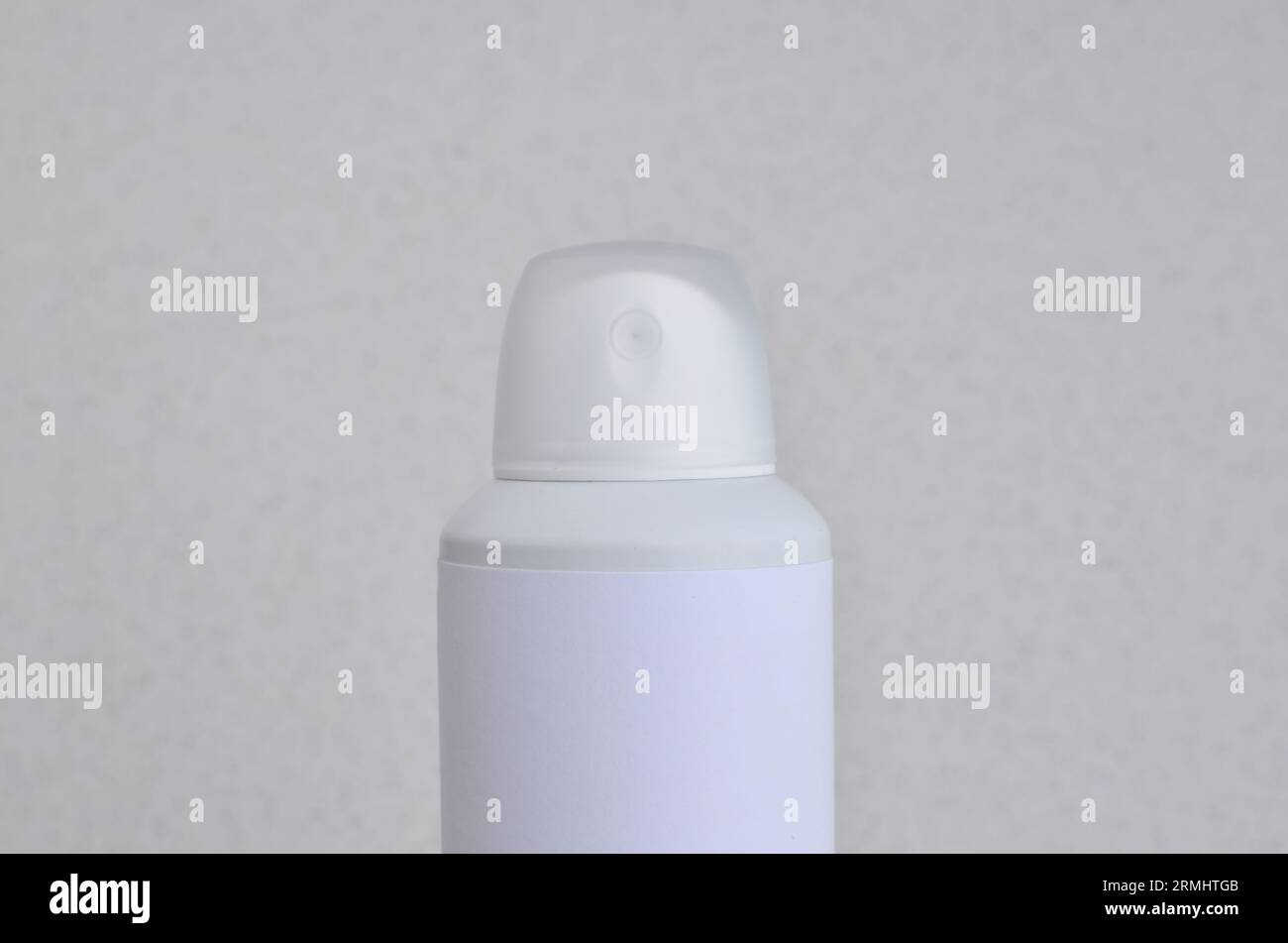 Close-up of spray deodorant with white label, conveying concepts of ...