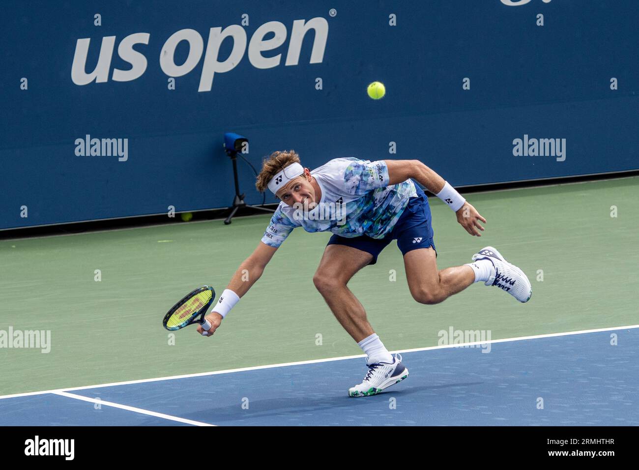 Casper Ruud (NOR) competing in the Men's Singles Round 1 at the 2023 US ...