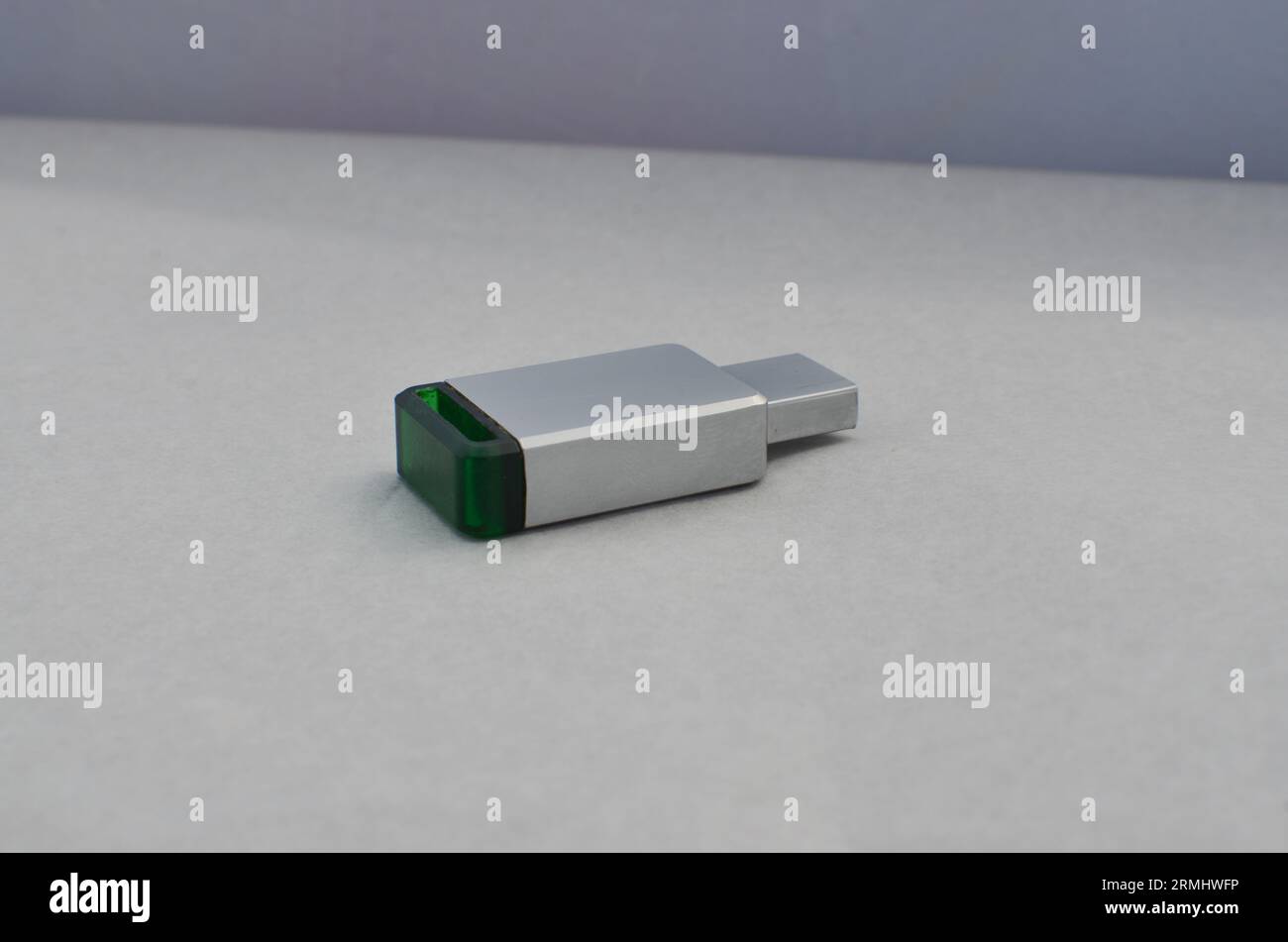 Aluminum flash drive close-up, modern and sturdy USB storage stick ...