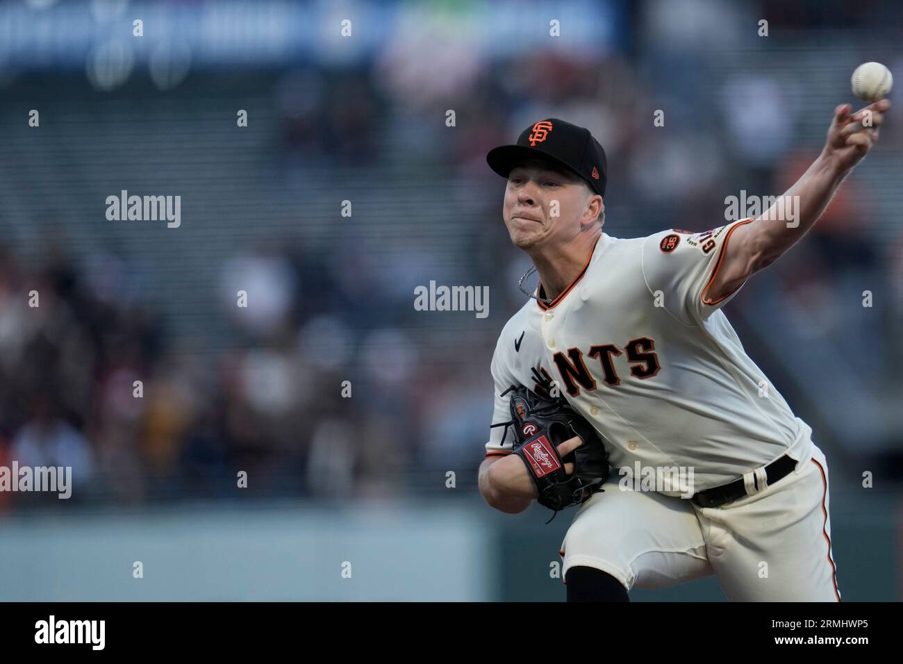 San Francisco Giants' Kyle Harrison pitches to a Cincinnati Reds batter ...