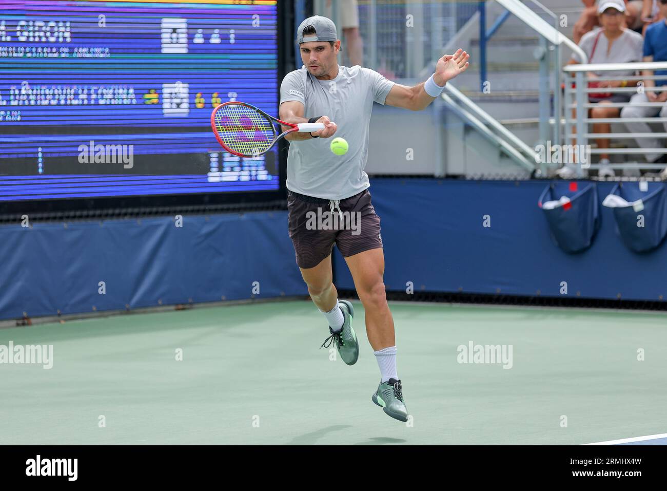 Marcos Giron in action during a men's singles match at the 2023 US Open ...