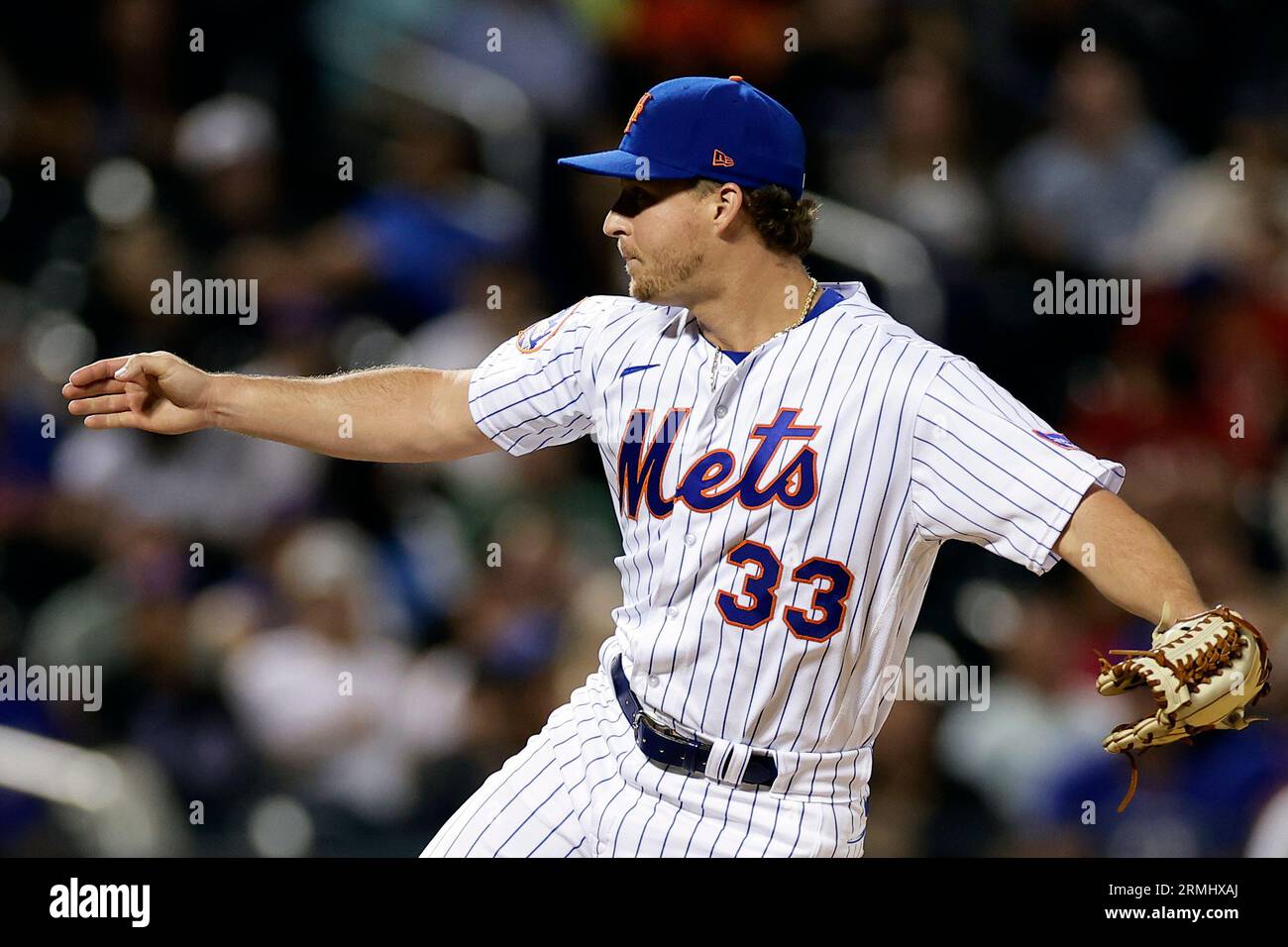 New York Mets pitcher Trevor Gott pitches against the Texas Rangers ...