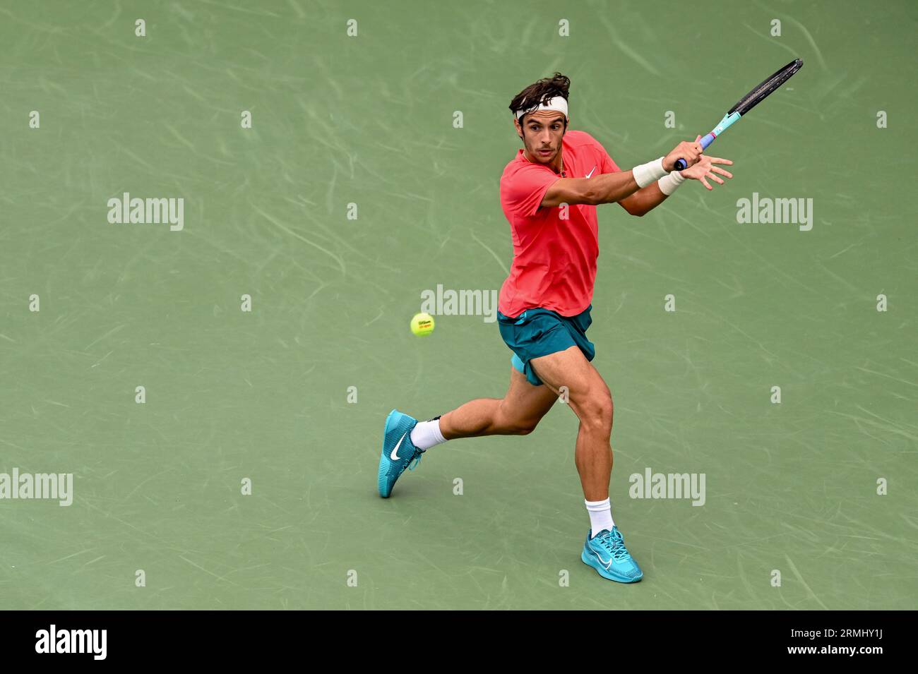 Lorenzo Musetti in action during a men's singles match at the 2023 US ...