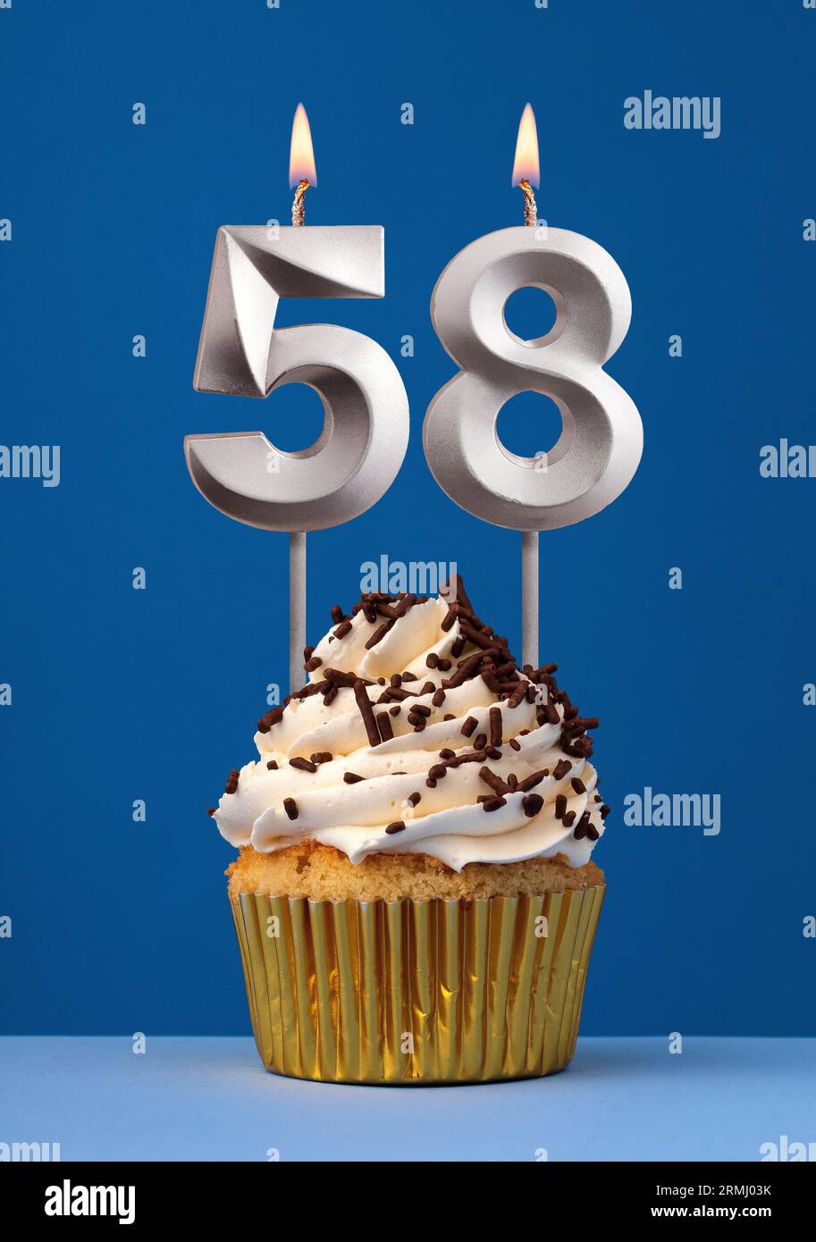Vertical birthday card with cake - Lit candle number 58 on blue ...