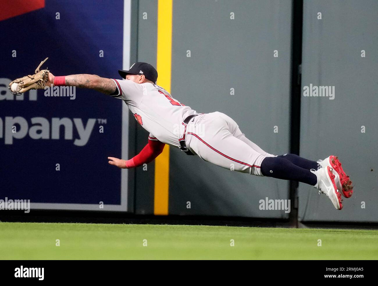 Atlanta Braves left fielder Kevin Pillar catches a fly ball off the bat ...