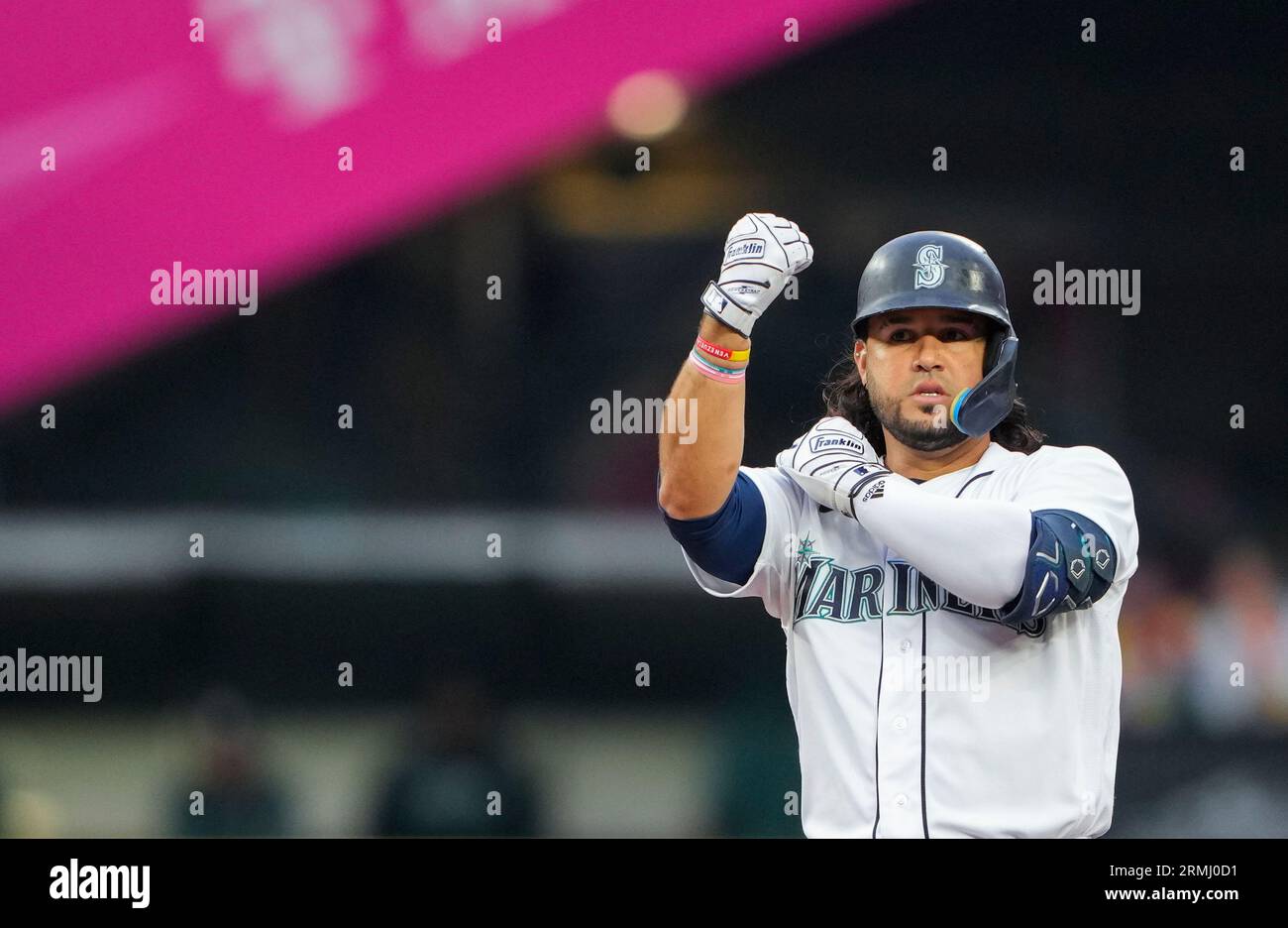 Seattle Mariners' Eugenio Suarez celebrates after hitting a double ...