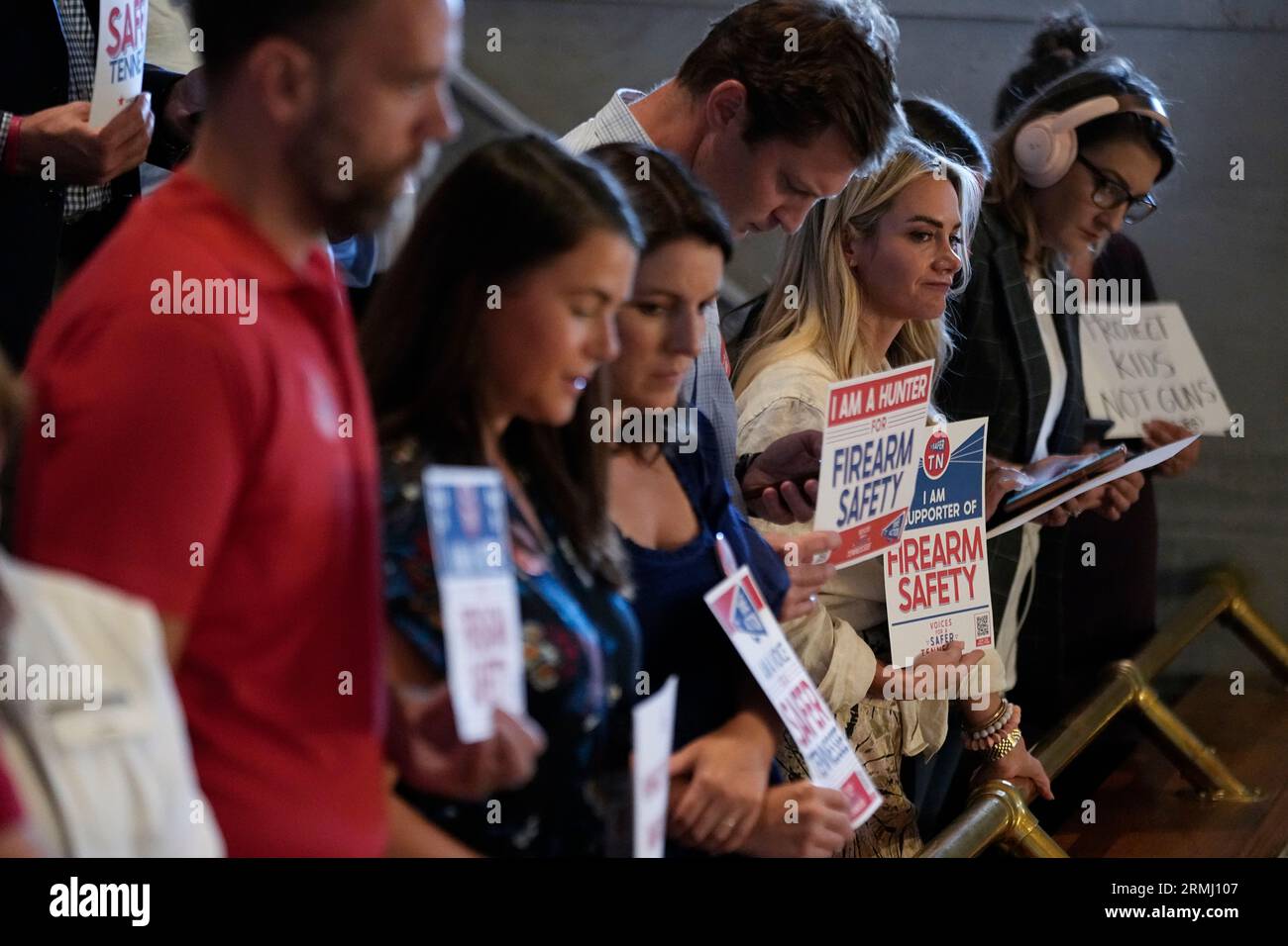 Demonstrators hold signs in the Senate gallery during a special session ...
