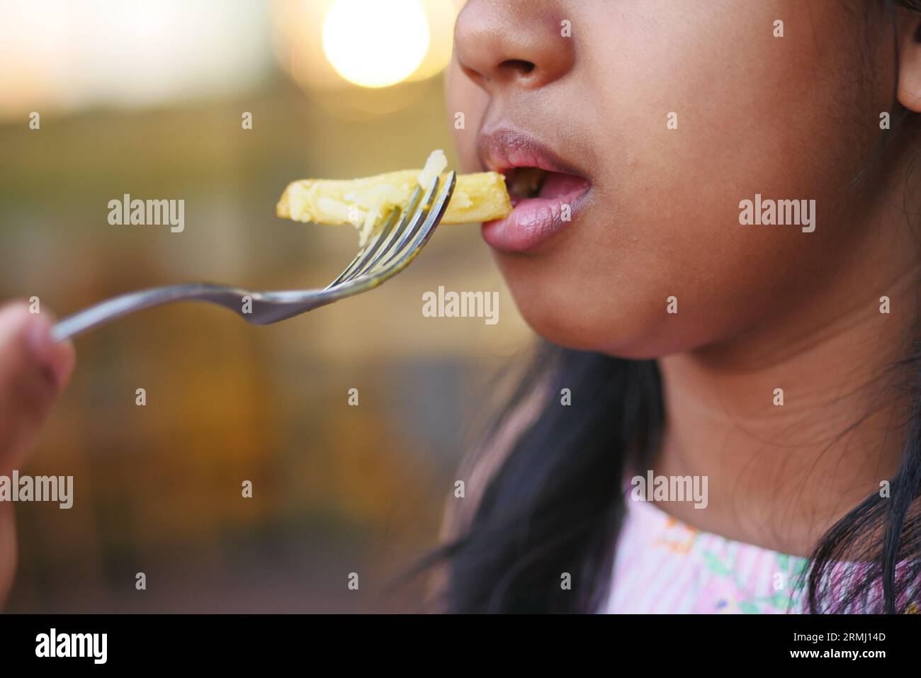 Kid hand french fries hi-res stock photography and images - Alamy