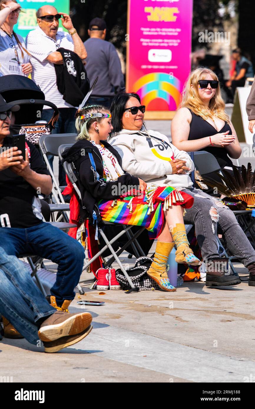 A jingle dancer sits after her competition at the 2 Spirit PowWow. As ...