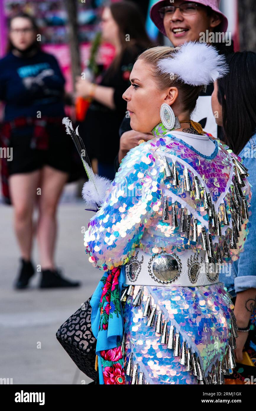 A Jingle dancer prepares for the open Jingle Dance Competition in the 2 ...
