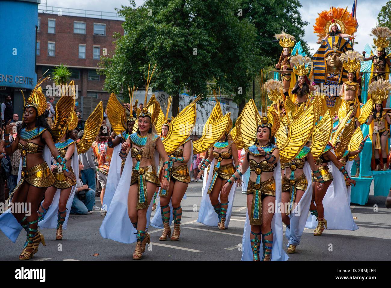 Samba dancers are seen dancing in Egyptian style costumes front of the ...