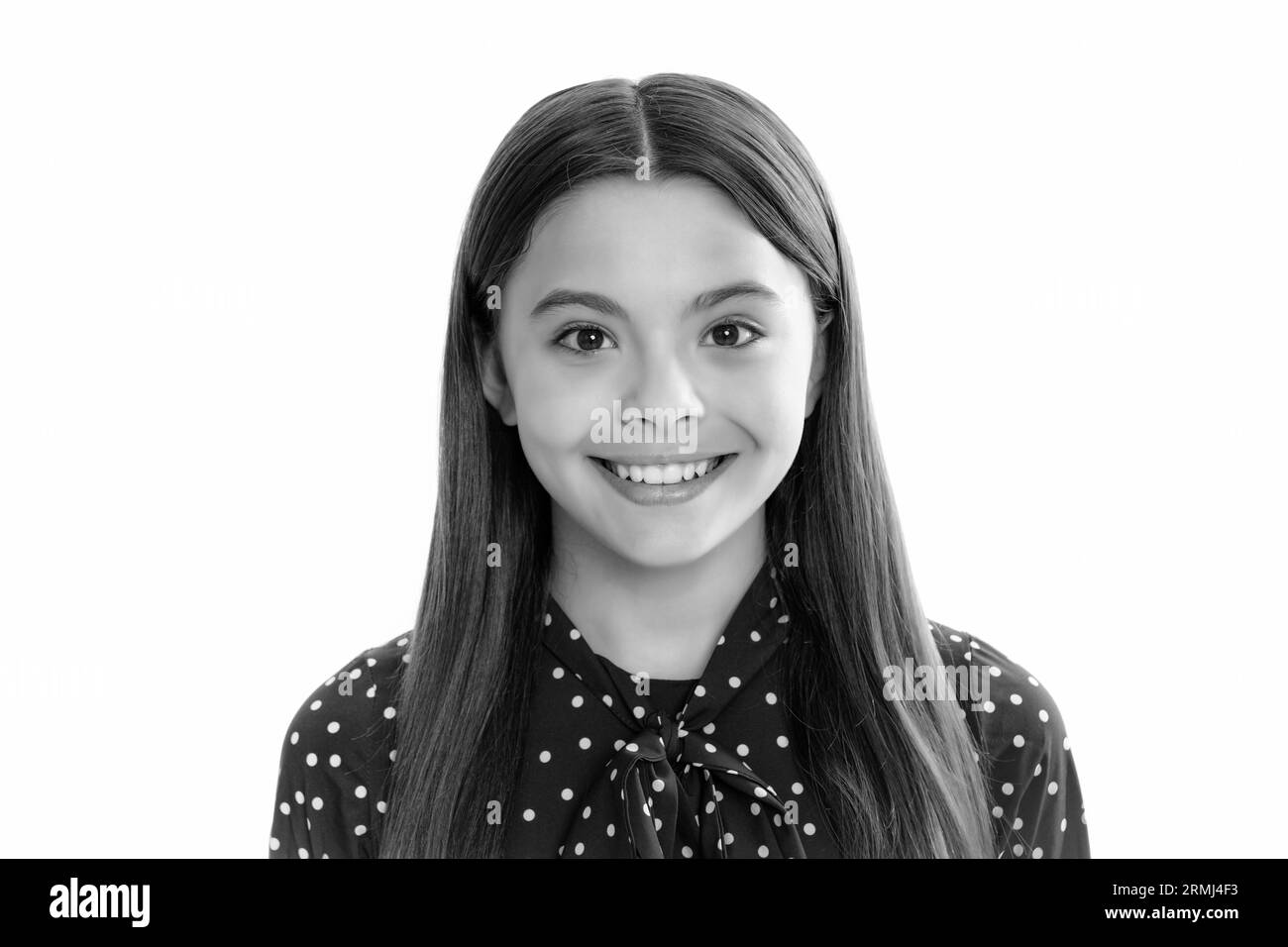 Portrait of happy smiling teenage child girl. Close up portrait of pretty teen girl. Latin or ...