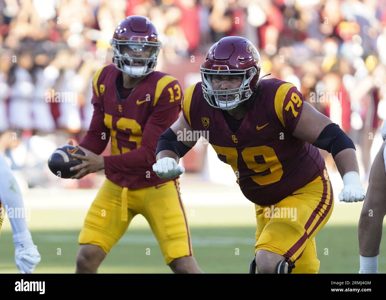 USC Trojans quarterback Caleb Williams (13) makes a play with the ...