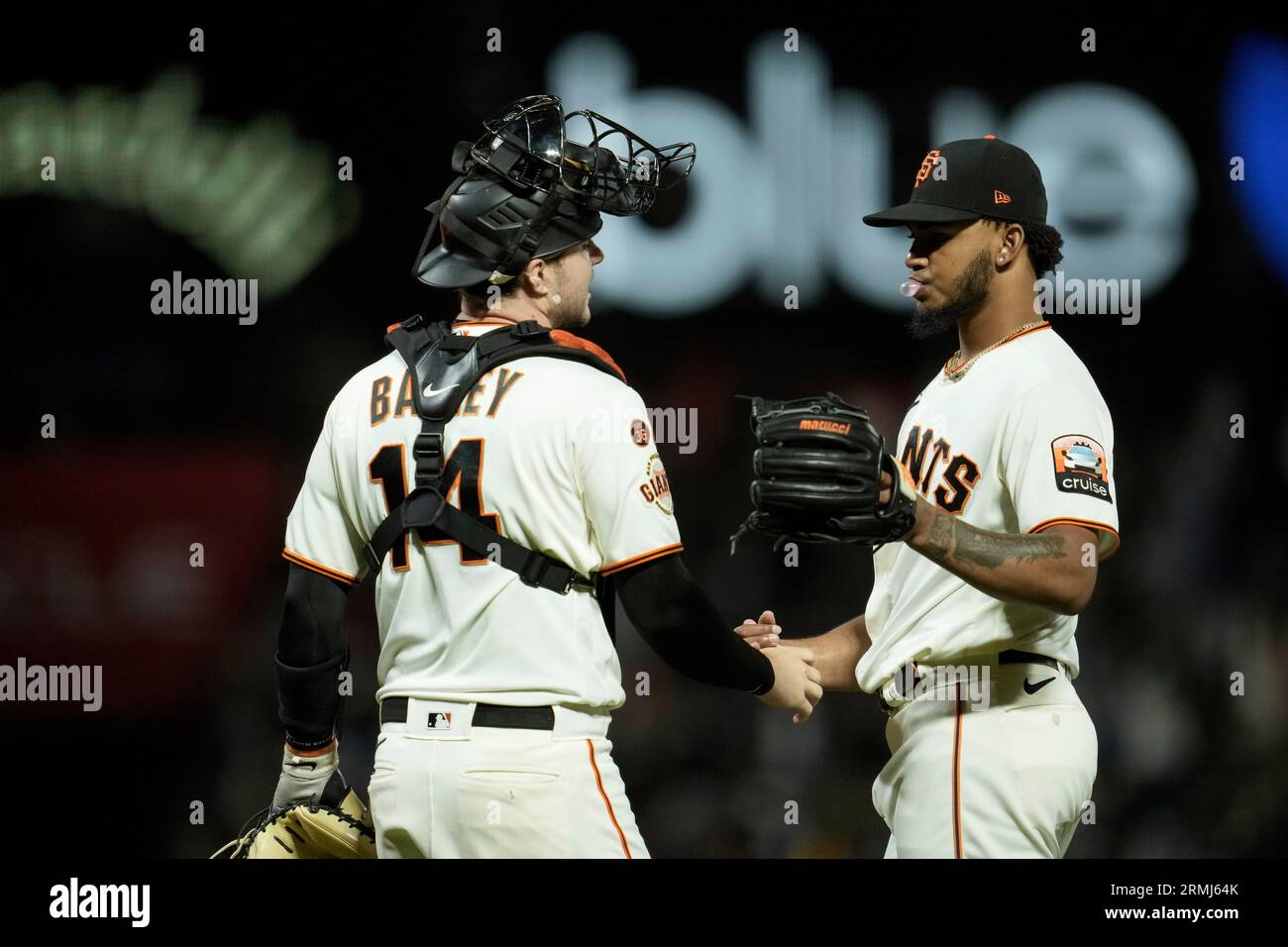 San Francisco Giants catcher Patrick Bailey, left, and pitcher Camilo ...