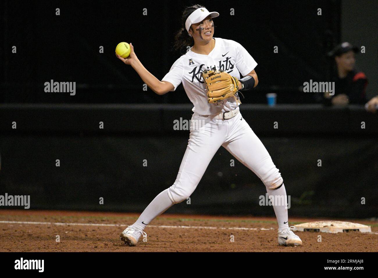 Central Florida infielder Micaela Macario (5) throws during an NCAA ...