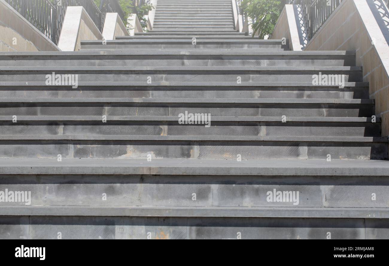 The modern staircase in the park with ascending stairs Stock Photo - Alamy