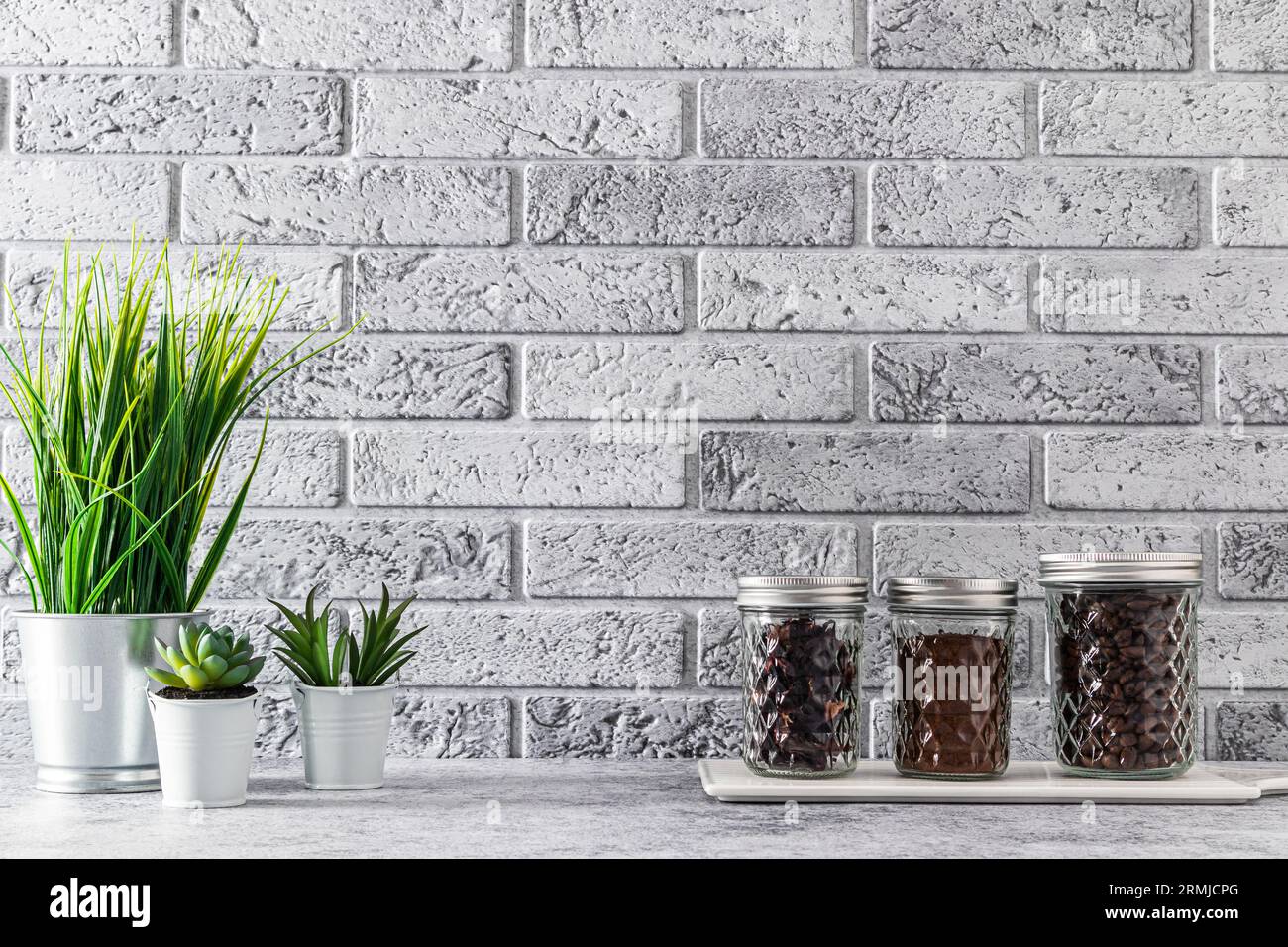 Stylish glass jars with metal lids for storing tea, coffee, sugar on ...