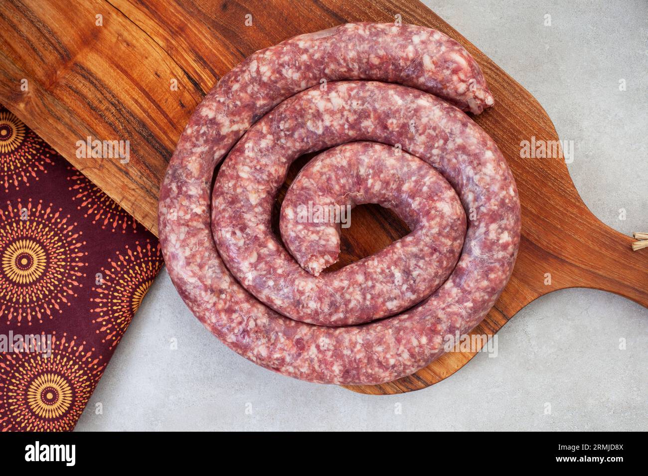 Traditional South African wors or sausage with iconic African printed ...