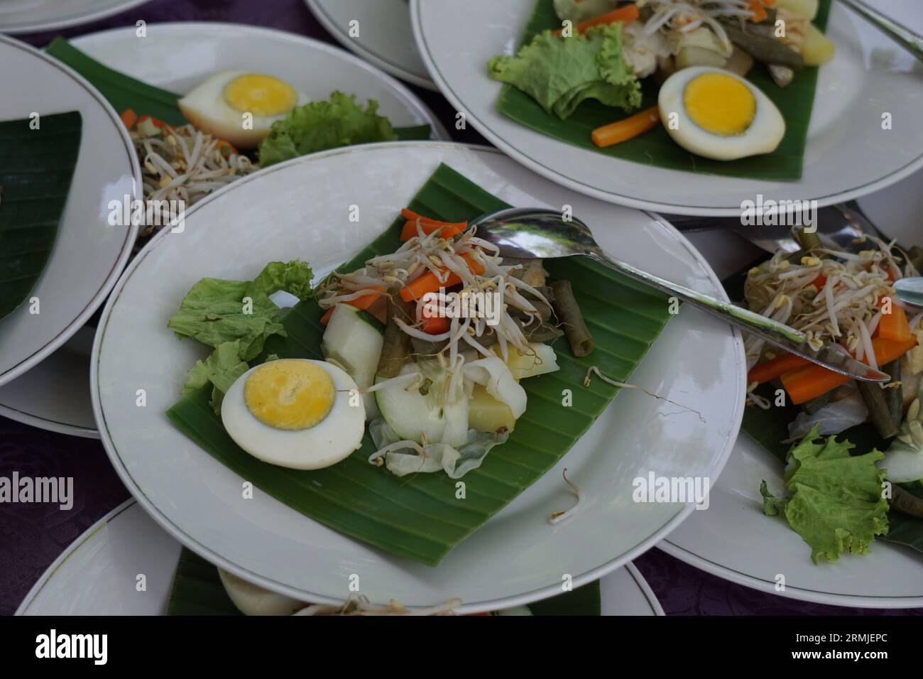 Gado-gado is a typical Indonesian food containing boiled vegetables ...