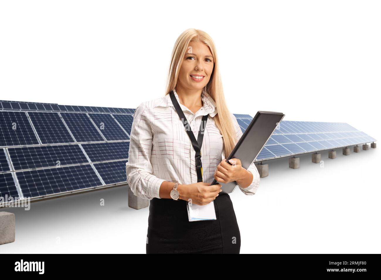 Young professional woman posing at a solar field isolated on white ...