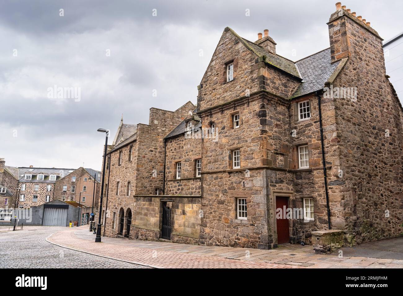 Very old picturesque stone houses in the center of the Scottish city of ...