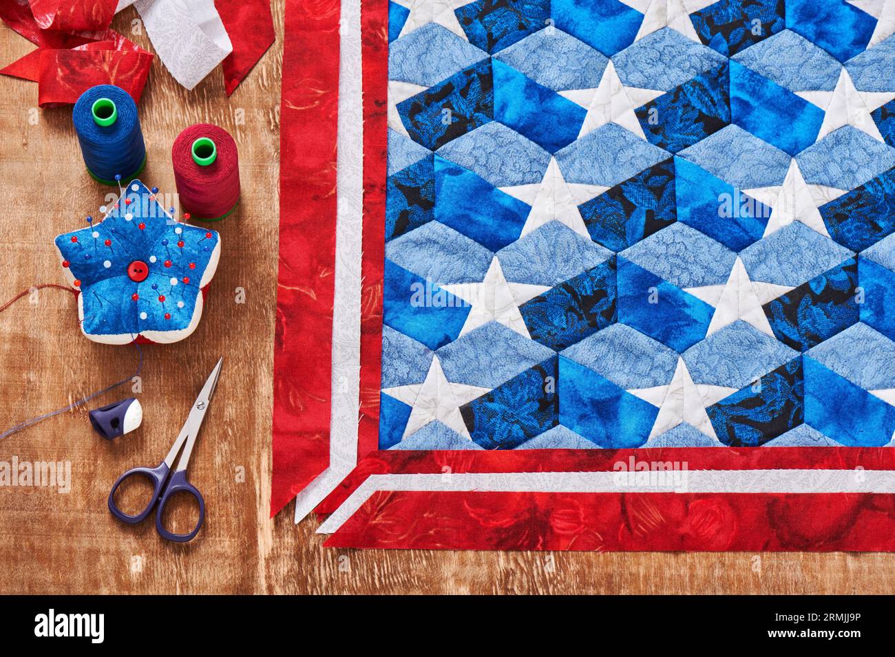 Sewing of quilt with stylized elements of American flag Stock Photo - Alamy
