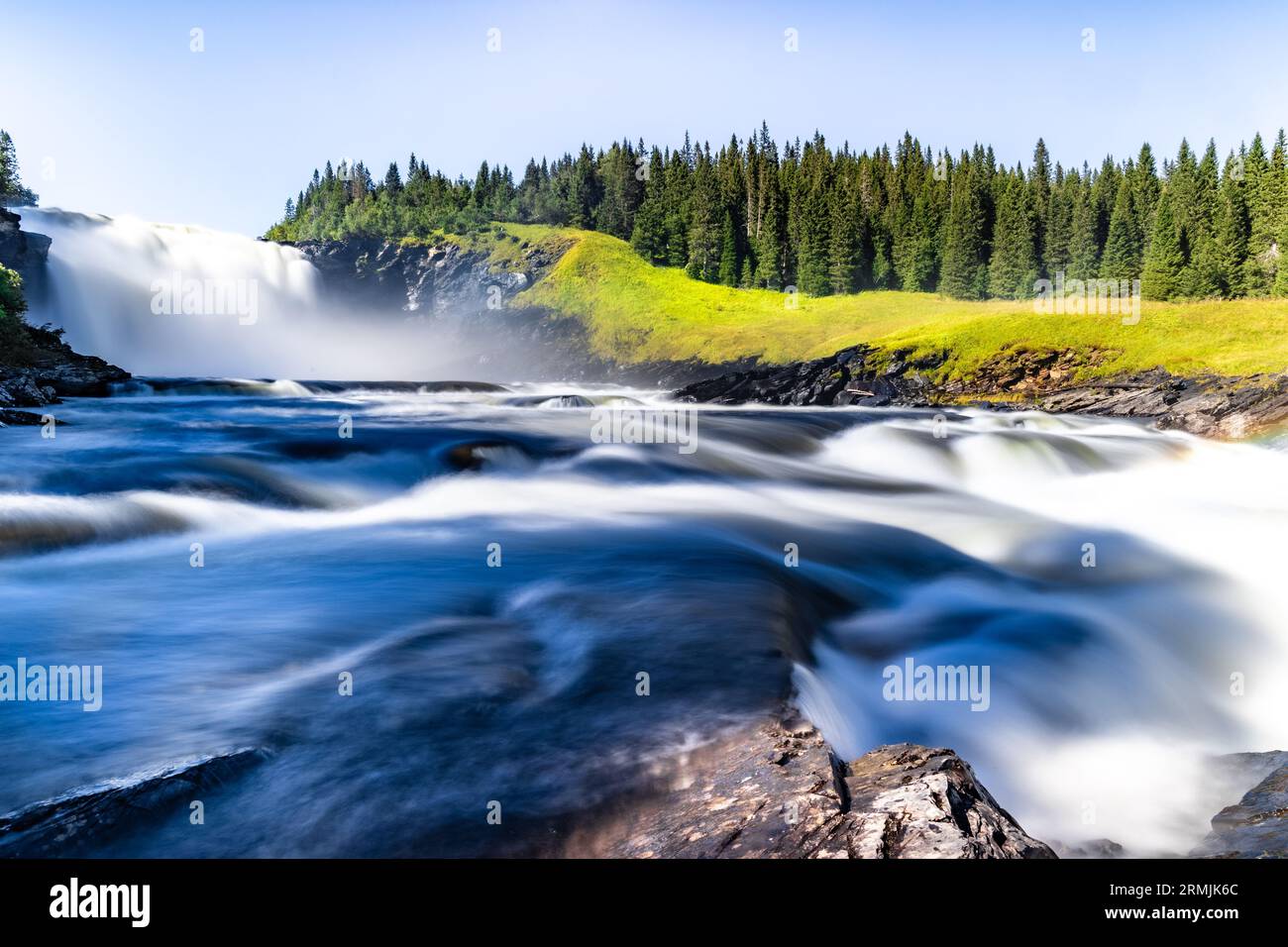A scenic view of Tannforsen Waterfall, biggest waterfall in Sweden ...