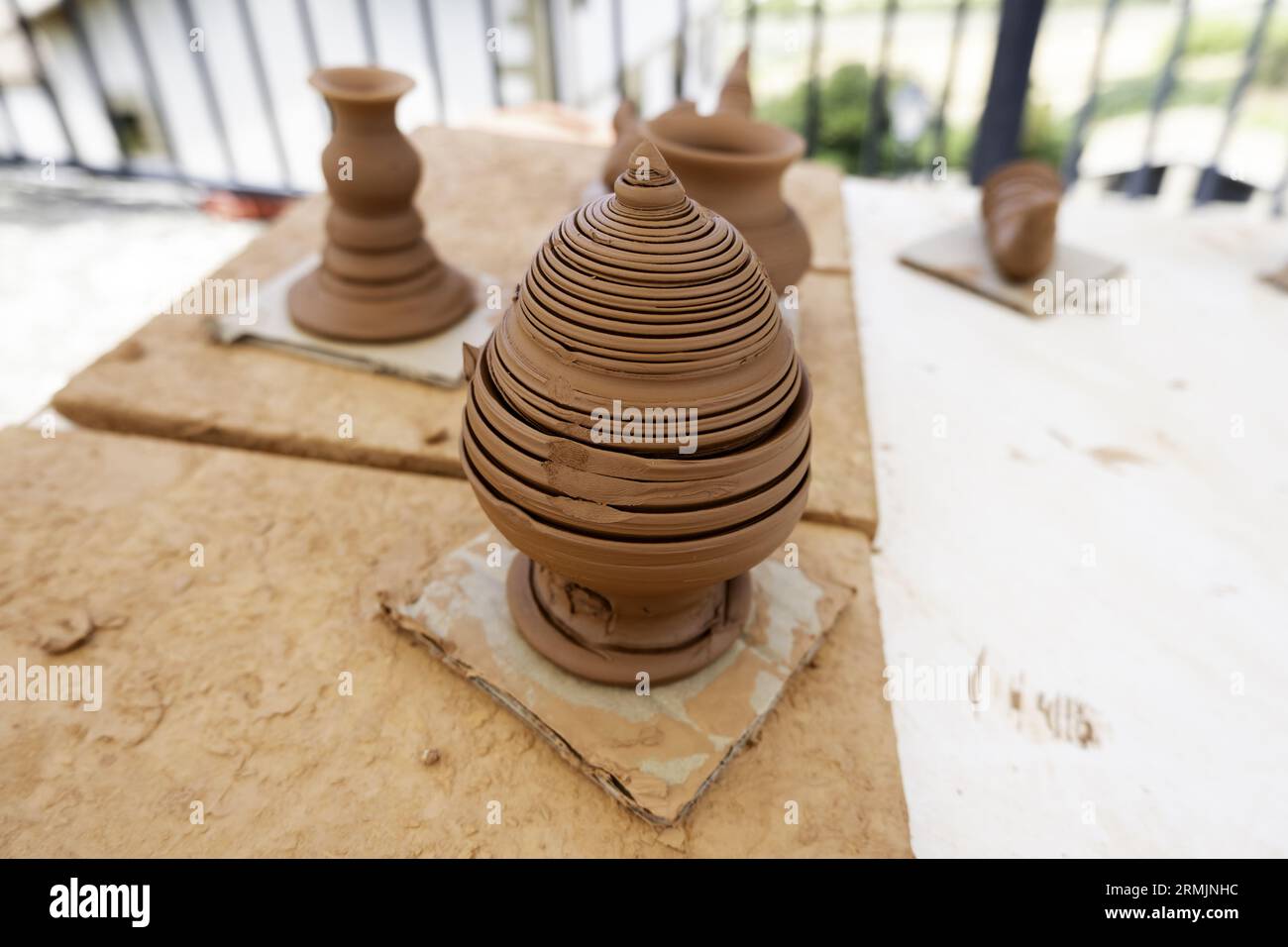 Detail of handmade clay figure, handicraft Stock Photo - Alamy
