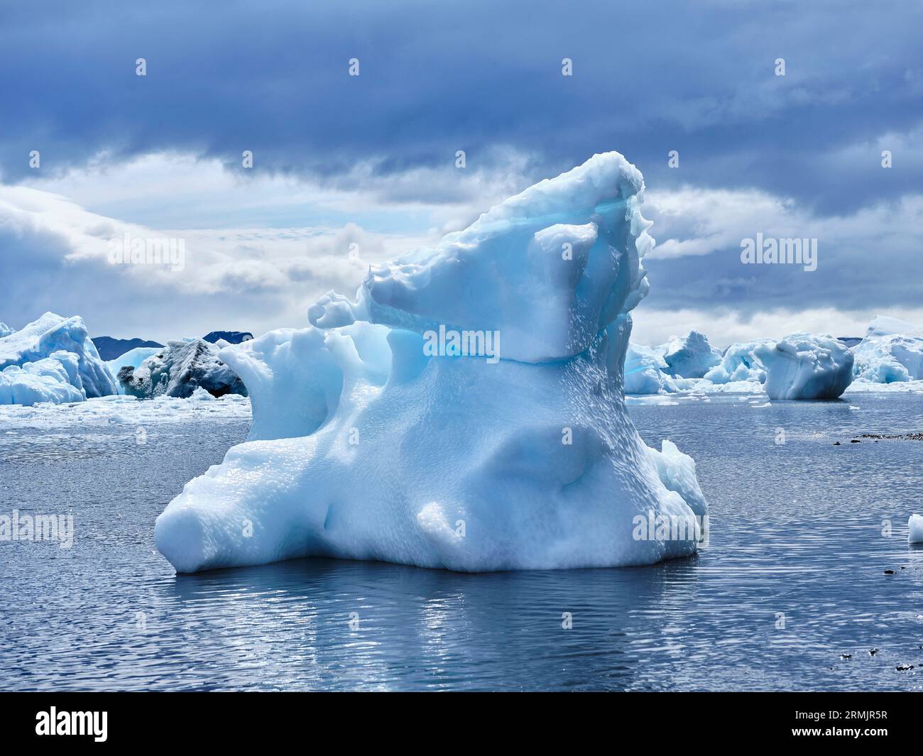 Blue iceberg formation above ocean surface, Antarctic Peninsula ...