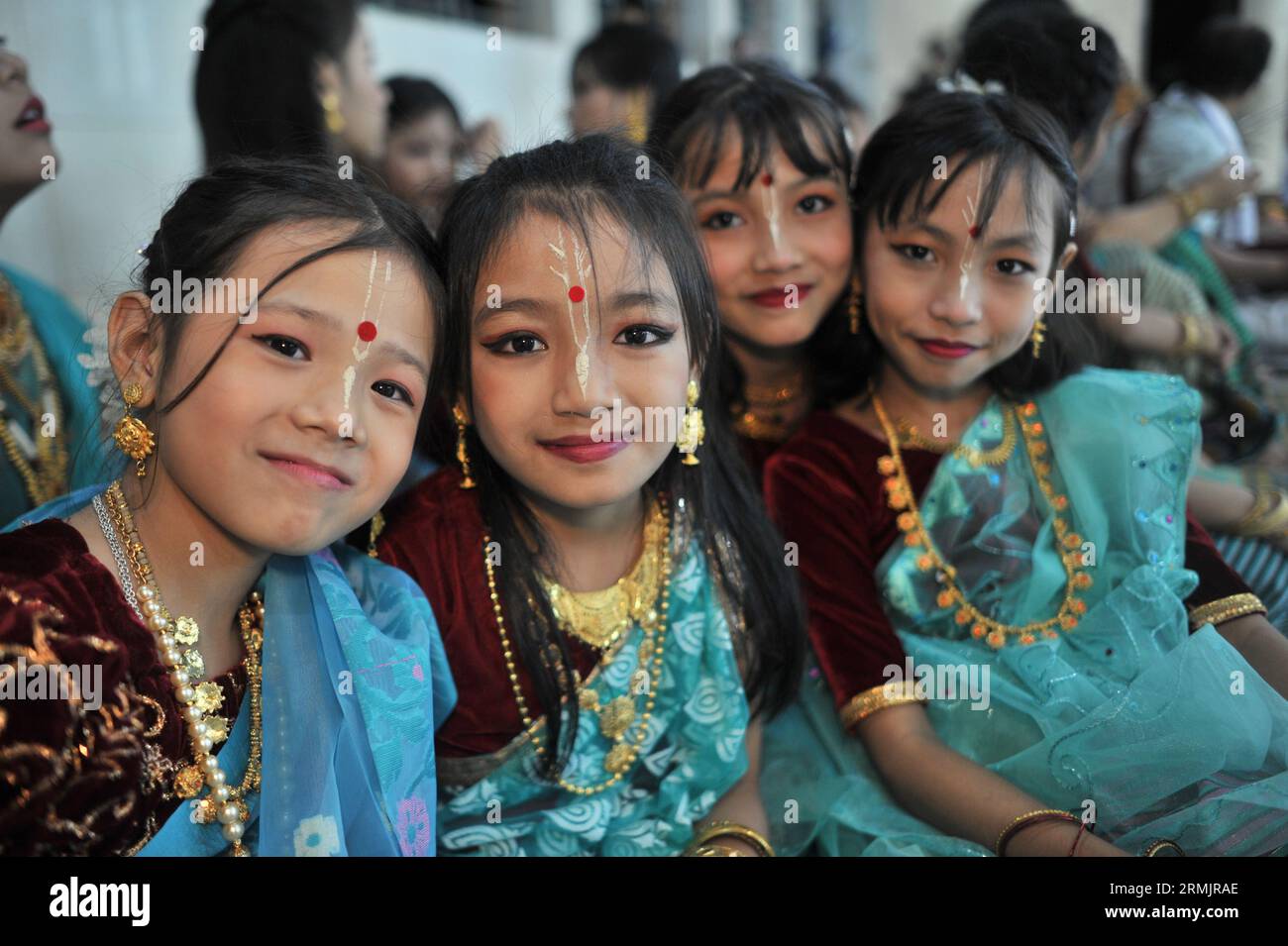 Portraits of little Manipuri girls with their traditional dresses. They ...