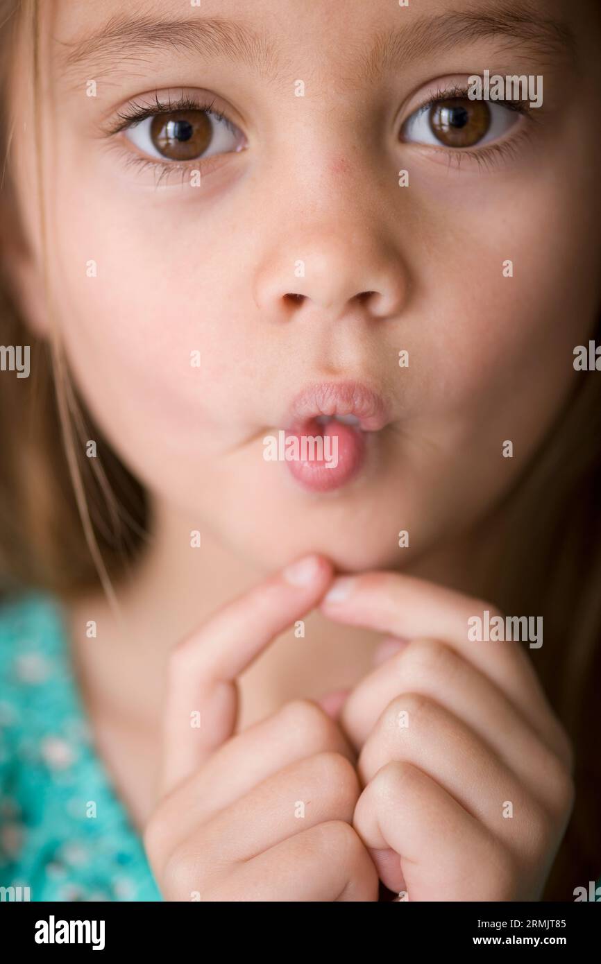 Kid pulling faces hi-res stock photography and images - Alamy