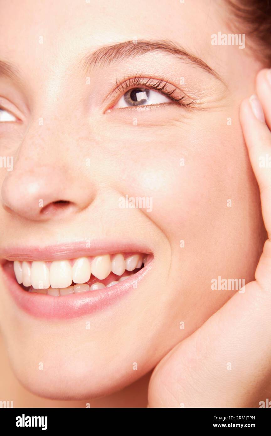 Woman resting face on hands hi-res stock photography and images - Alamy