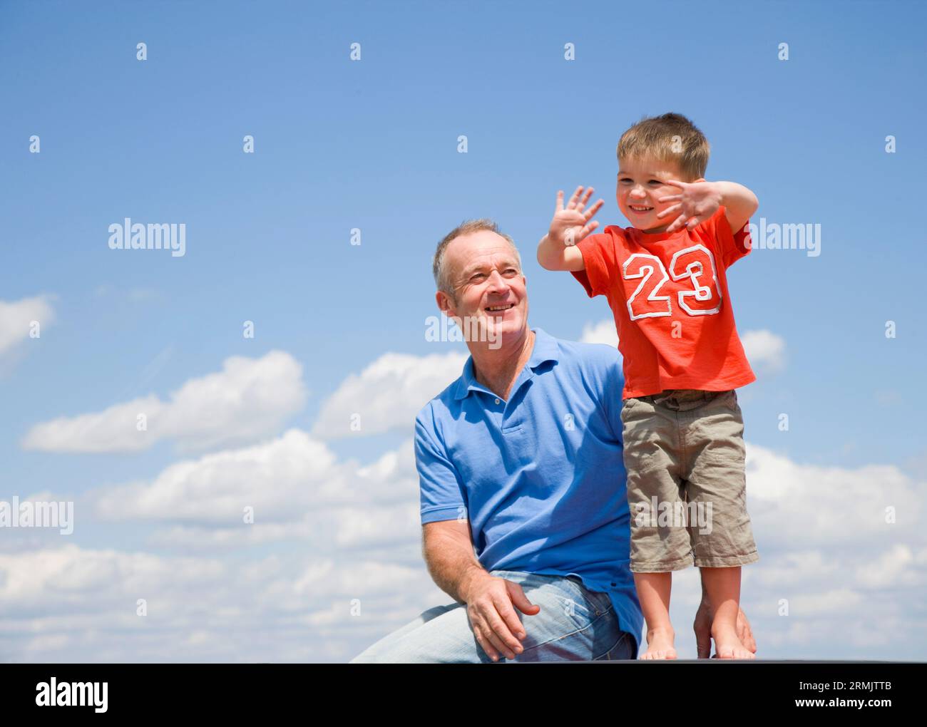 Portrait of father and young son Stock Photo - Alamy
