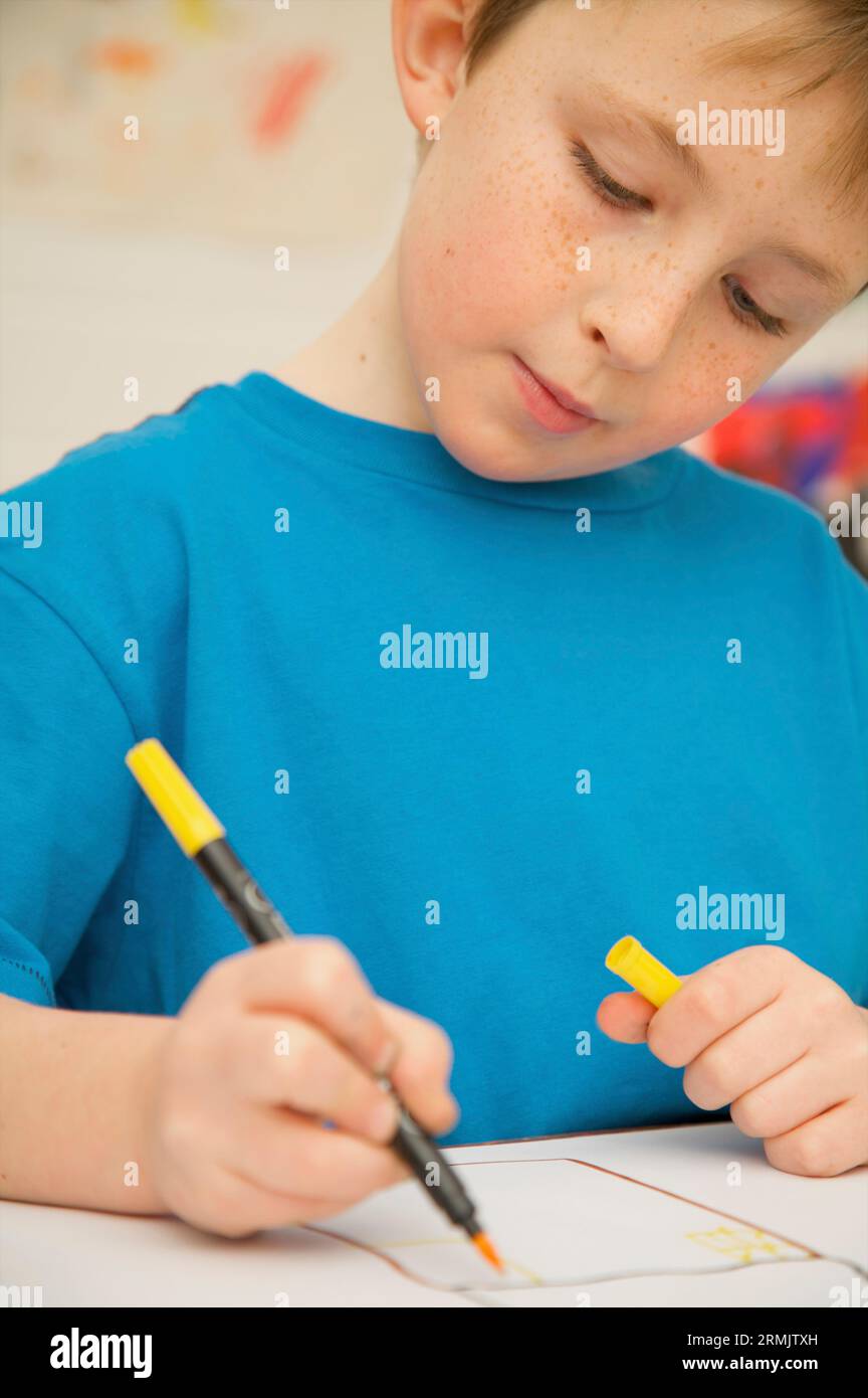 Boy coloring hi-res stock photography and images - Alamy