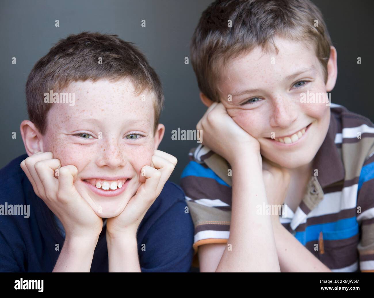 Portrait of two young boys smiling Stock Photo - Alamy