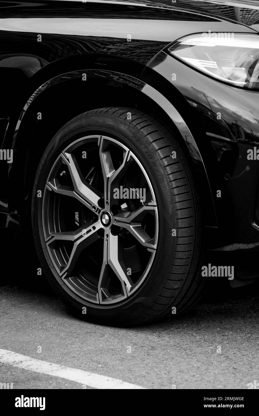 Minsk, Belarus, August 2023 - BMW X6 brake caliper behind a black wheel ...