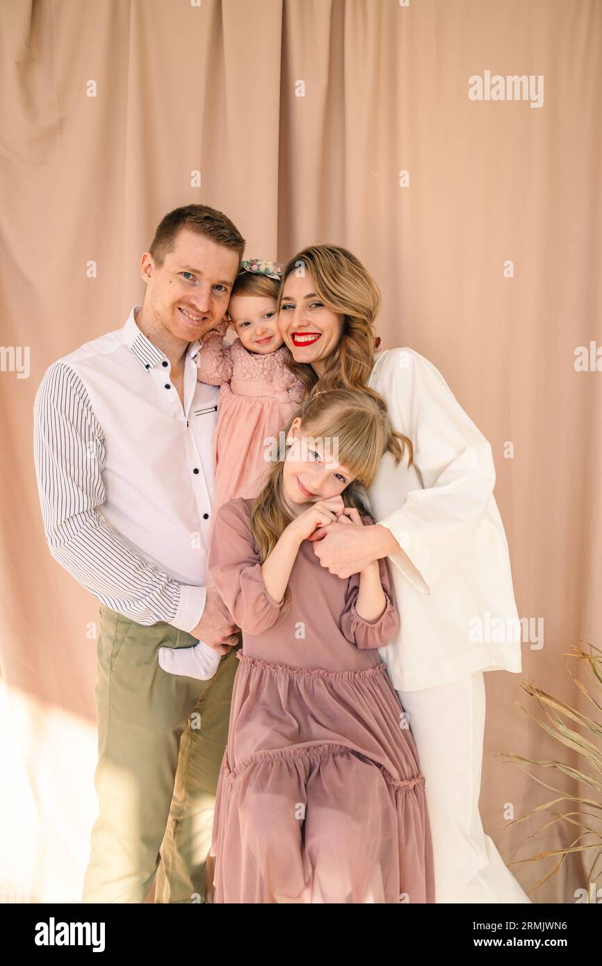 Mother father two daughters studio hi-res stock photography and images ...