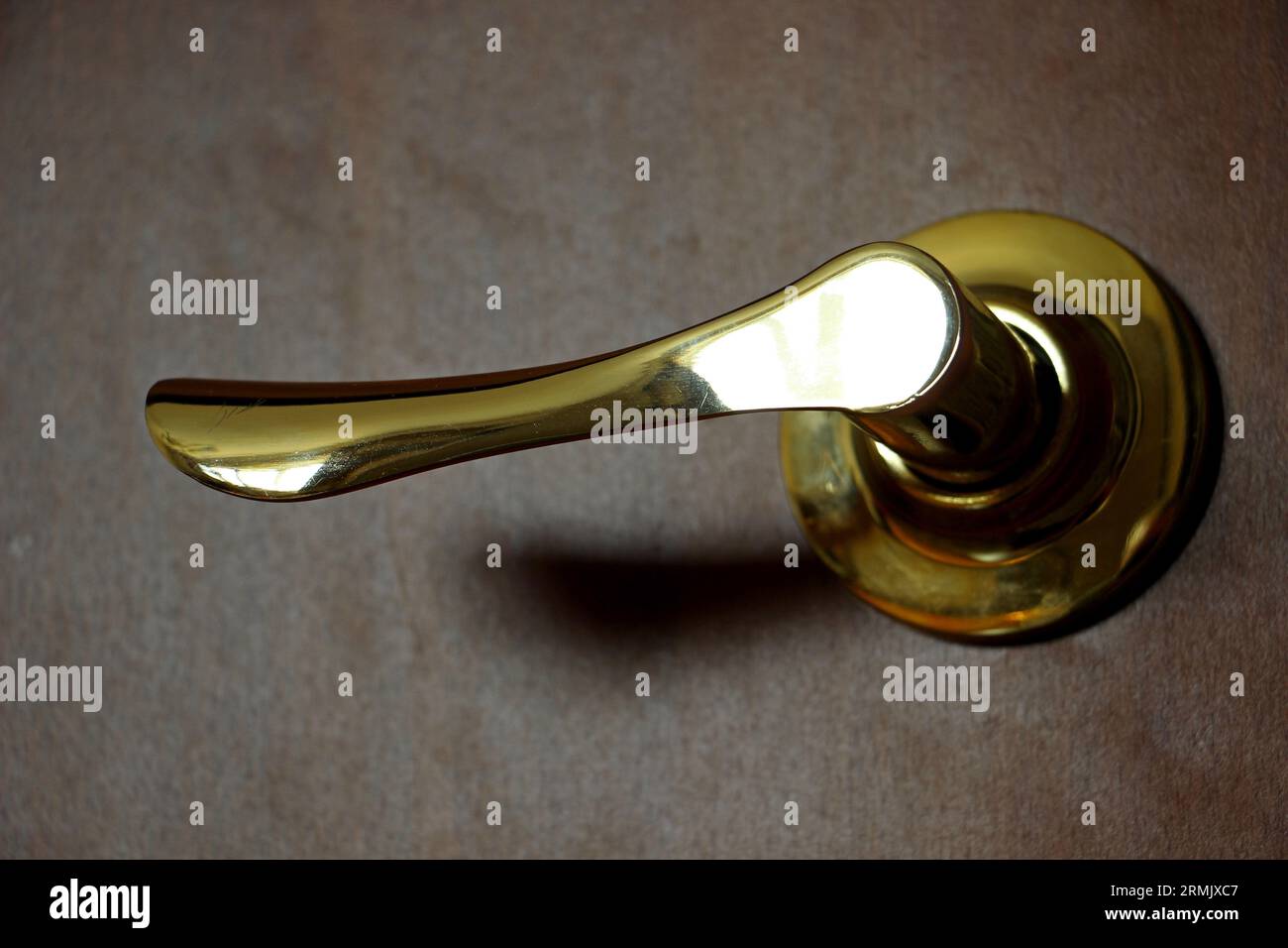 built-in gold door handle Stock Photo - Alamy