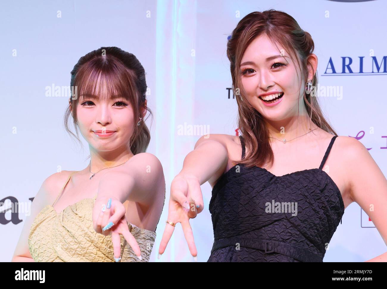 Tokyo, Japan. 29th Aug, 2023. Japanese models Yuchami (R) and her ...