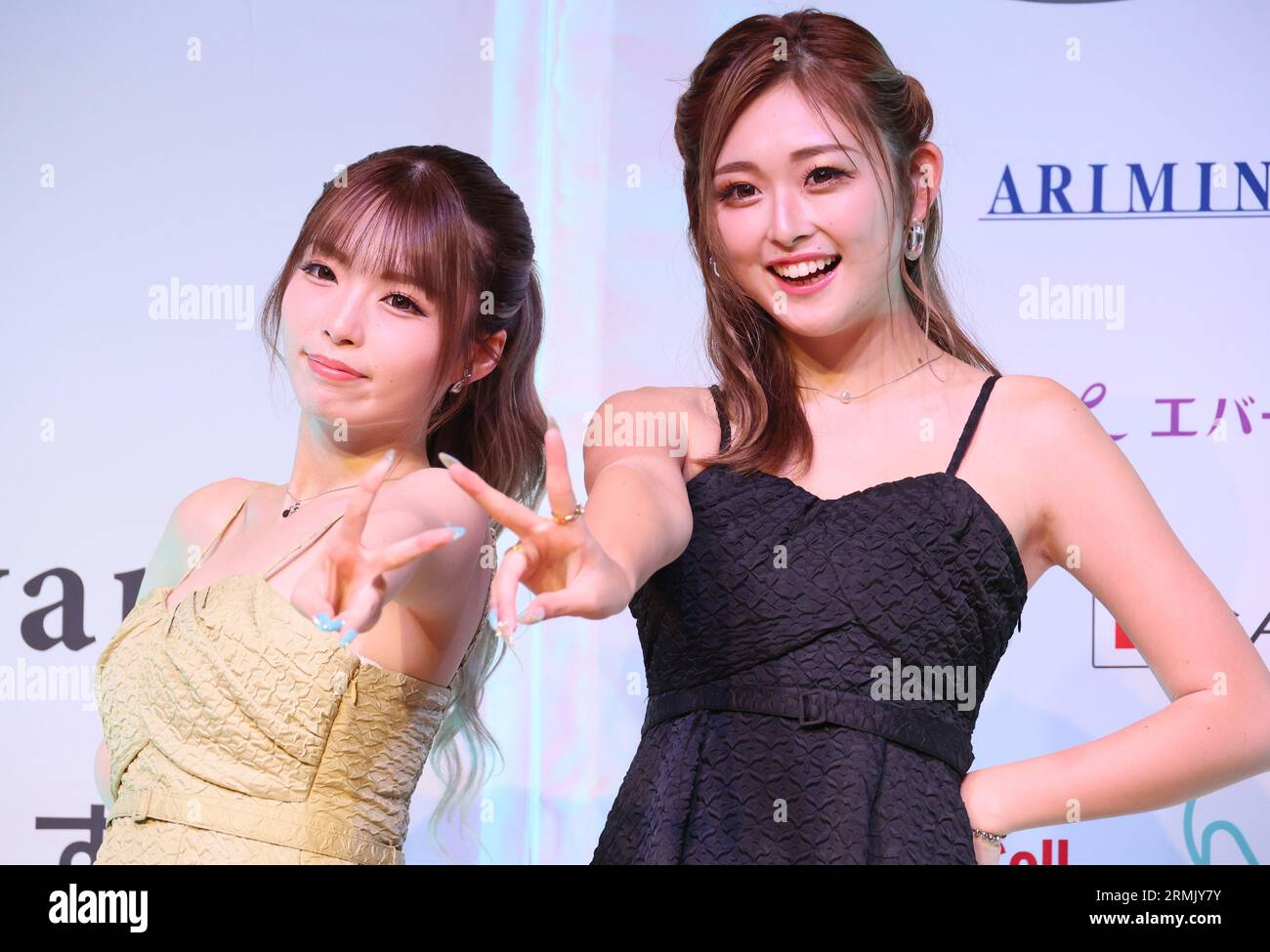 Tokyo, Japan. 29th Aug, 2023. Japanese models Yuchami (R) and her ...