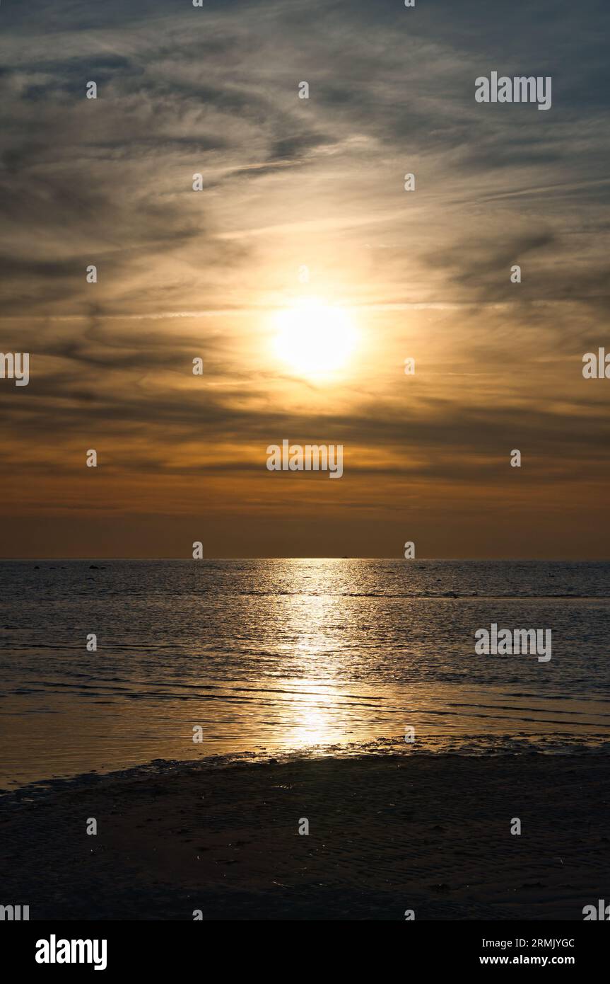 Sunset, illuminated sea. Light waves. Poel island on the Baltic Sea ...