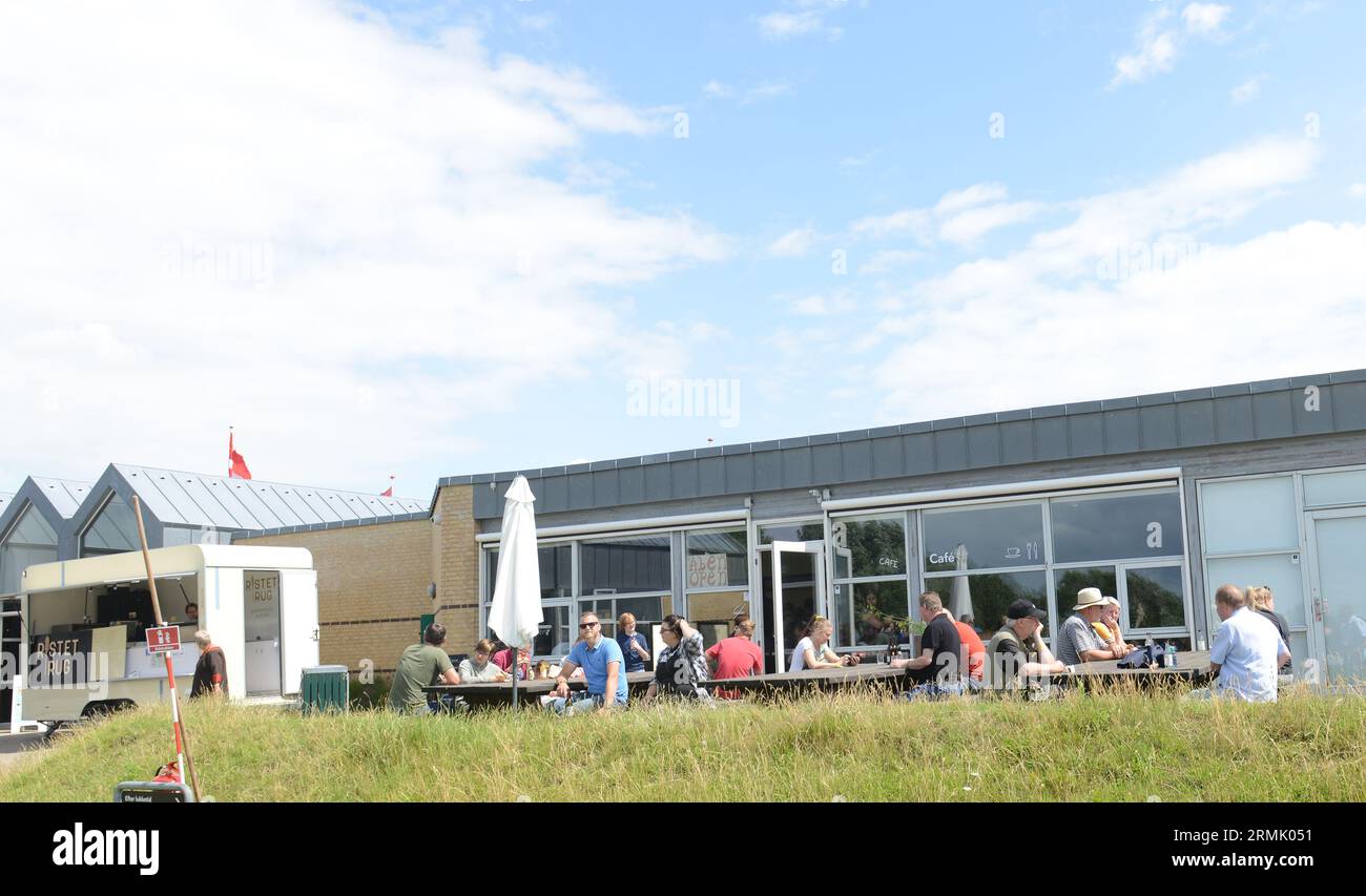 Tourist sitting in the cafe at the museum of the Viking Age in ...